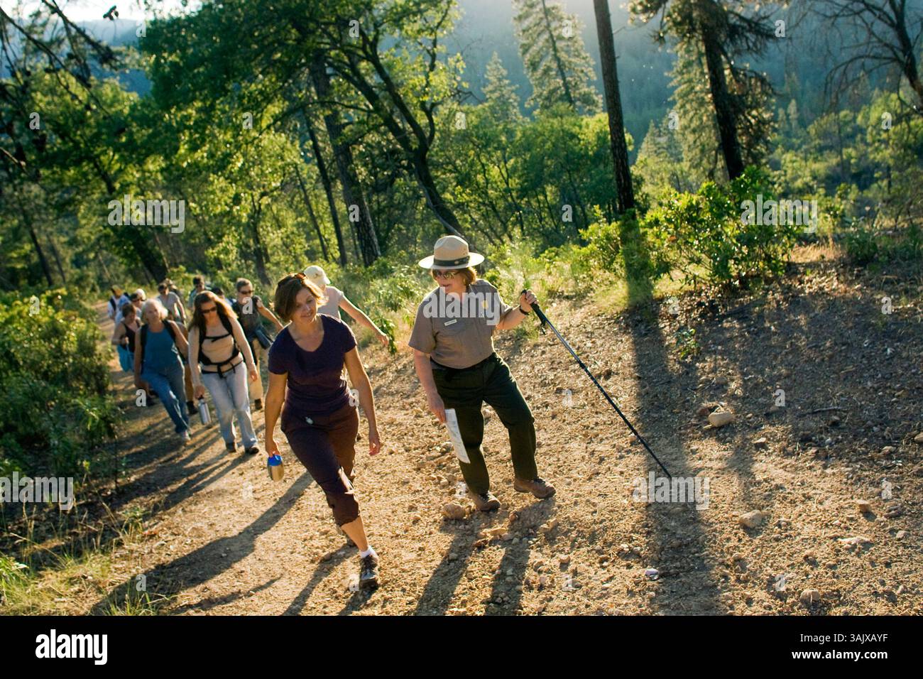 Park Ranger Nancy Quirus, right, leads hikers up the trail Sunday ...