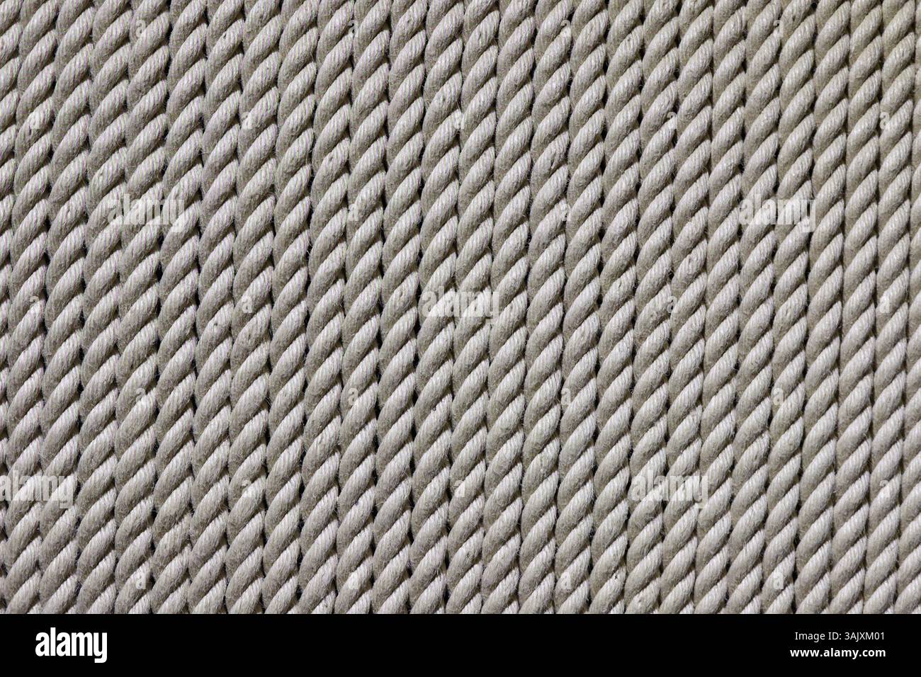 Rope background pattern of twisted natural flax traditionally crafted ...