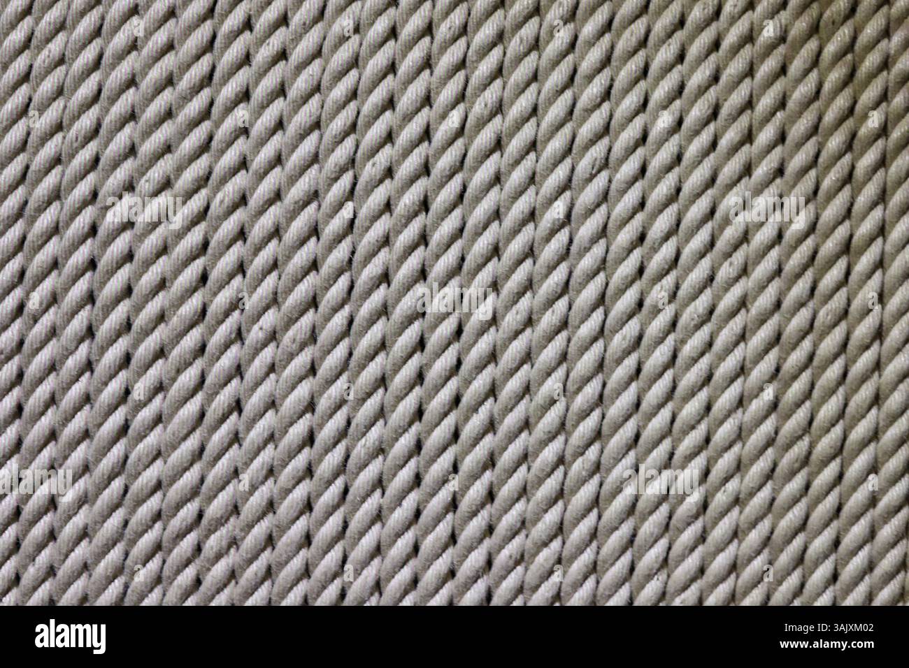 Rope background pattern of twisted natural flax traditionally crafted ...