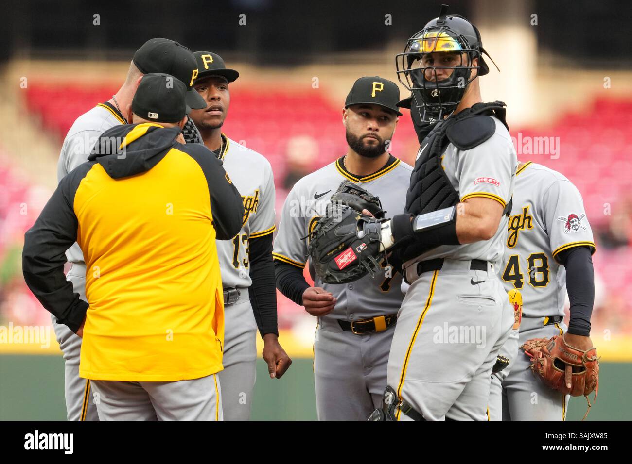 Pittsburgh Pirates players gather at the pitcher's mound during the ...
