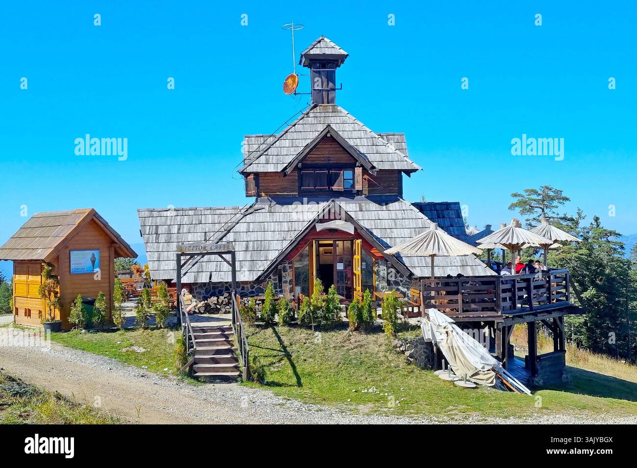 Cozy Visitor Cafe in traditional Serbian style with multi-tiered timber ...