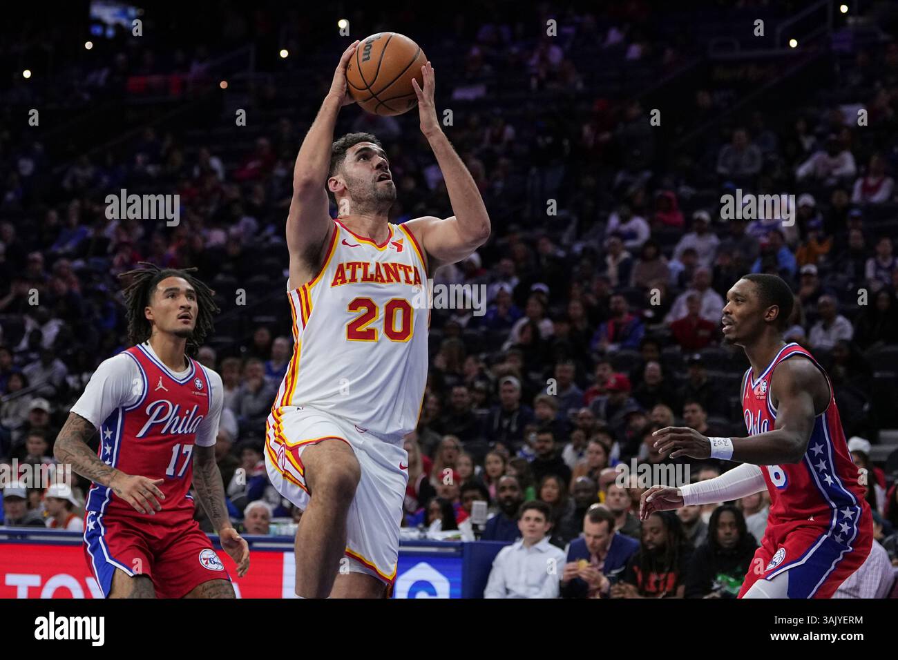 Atlanta Hawks' Georges Niang (20) goes up to shoot against Philadelphia ...