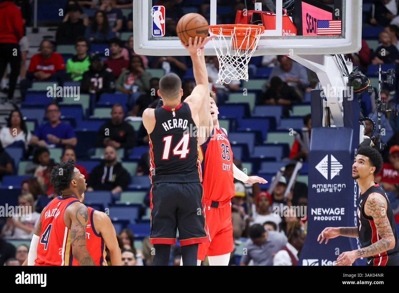 Miami Heat guard Tyler Herro (14) shoots a one-handed jumper over New ...