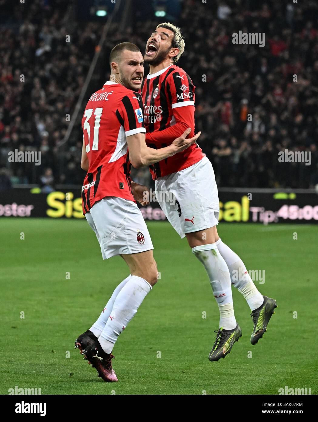 Udine, Italy. 11th Apr, 2025. AC Milan's Strahinja Pavlovic (L ...