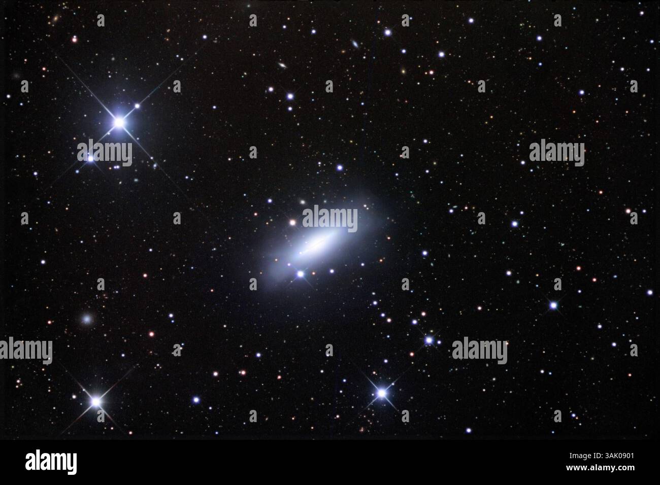 Lenticular galaxy M102, optical image. This lenticular (disc-shaped ...