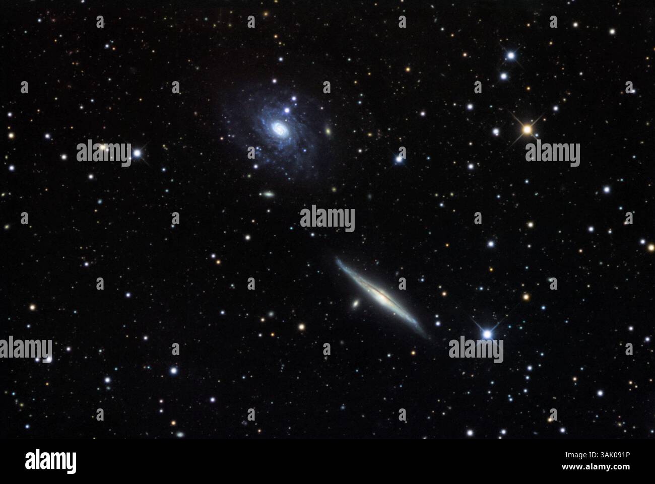 Spiral galaxies (NGC 5965, lower right, and NGC 5963, upper centre ...