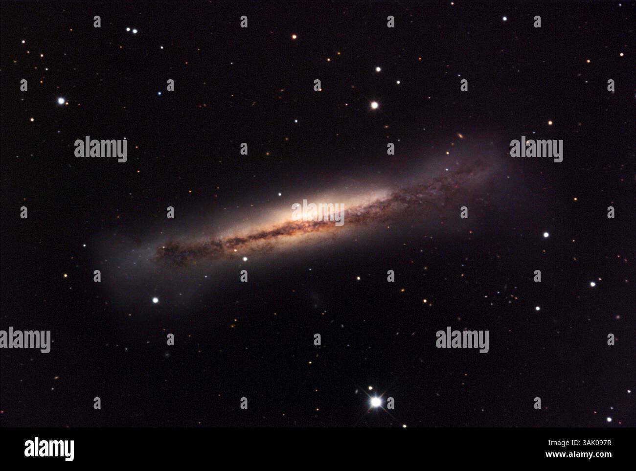 Barred spiral galaxy NGC 3628. This galaxy is seen edge on from Earth ...