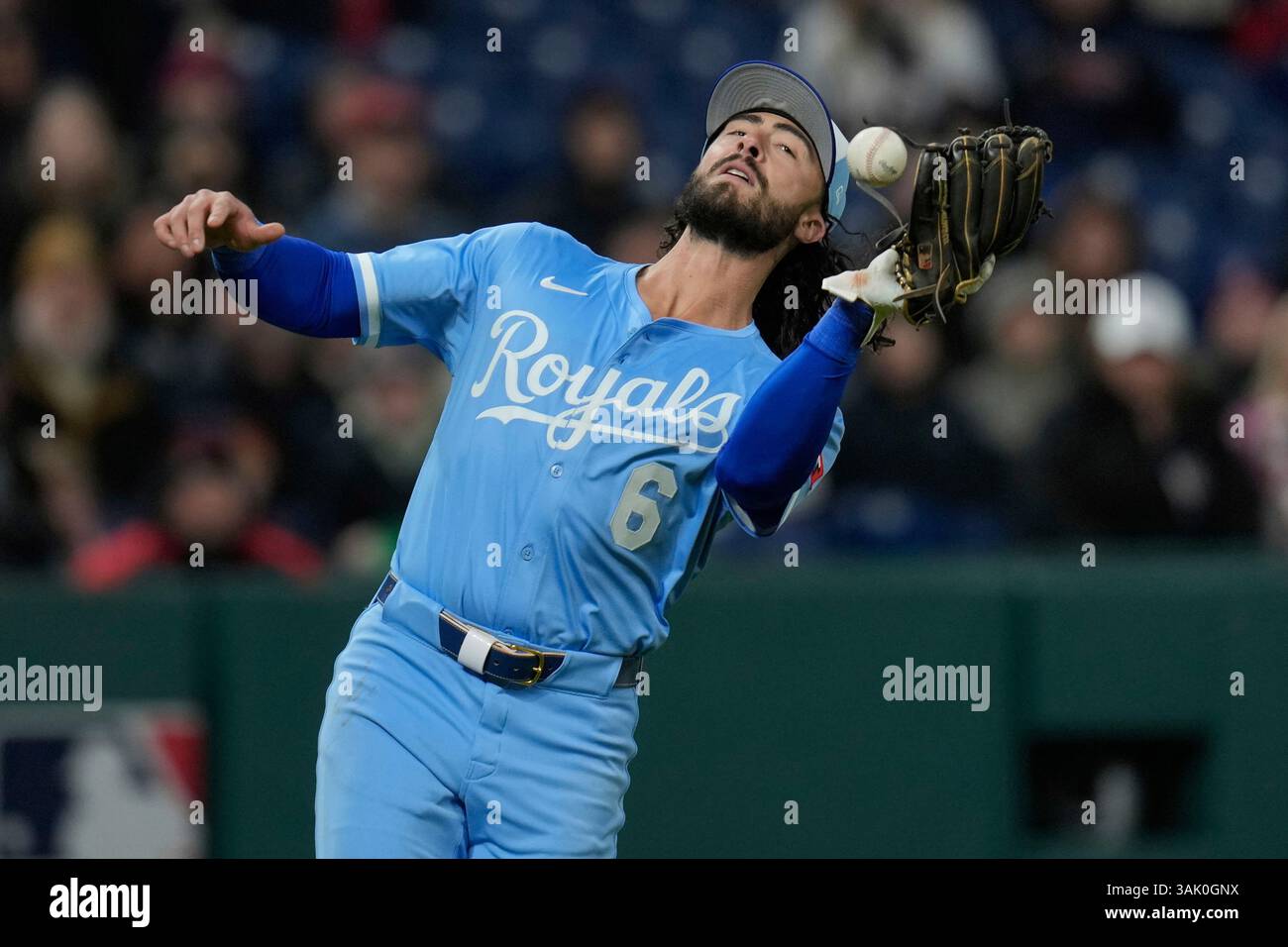 Kansas City Royals third baseman Jonathan India fumbles the catch on a ...