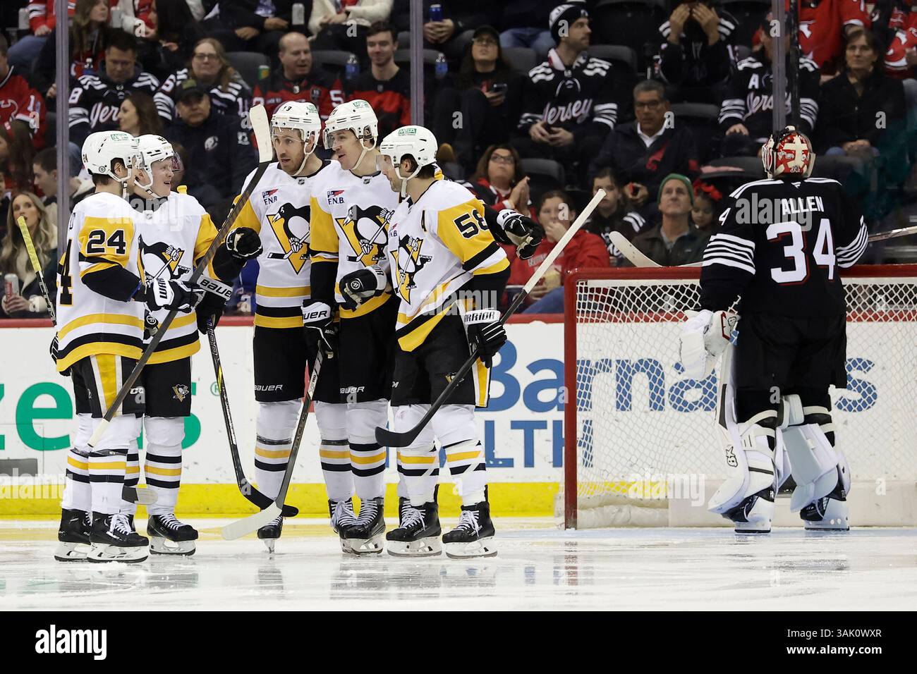Pittsburgh Penguins right wing Valtteri Puustinen, second from left, is ...