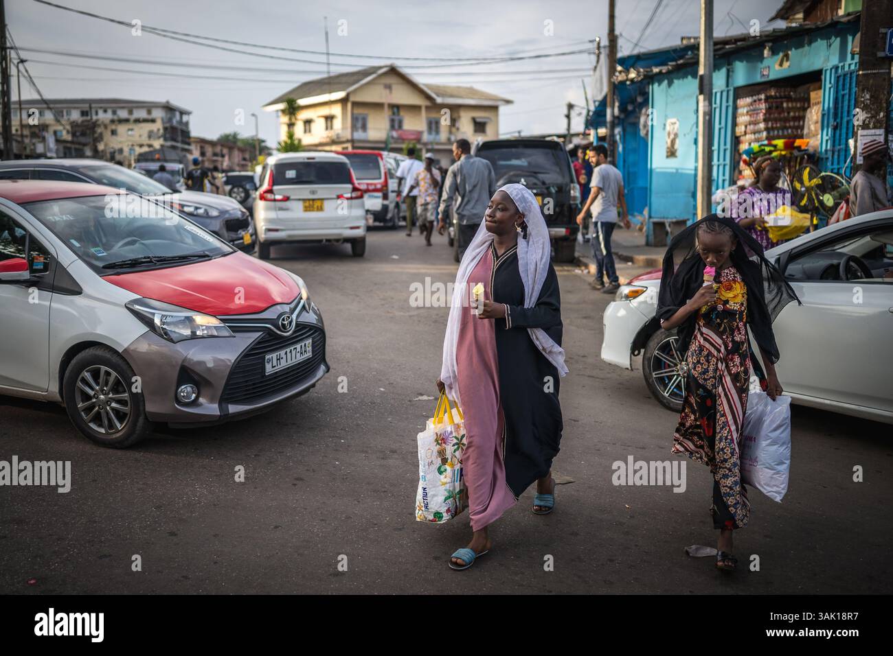 Libreville, Gabon. 10th Apr, 2025. People walk at mont-bouet market in ...