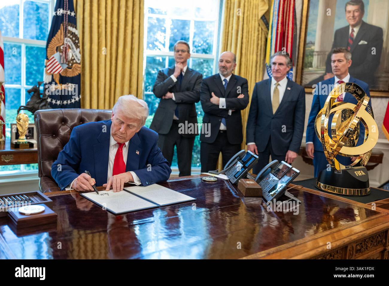 President Donald Trump signs Executive Orders, Wednesday, April 9, 2025 ...