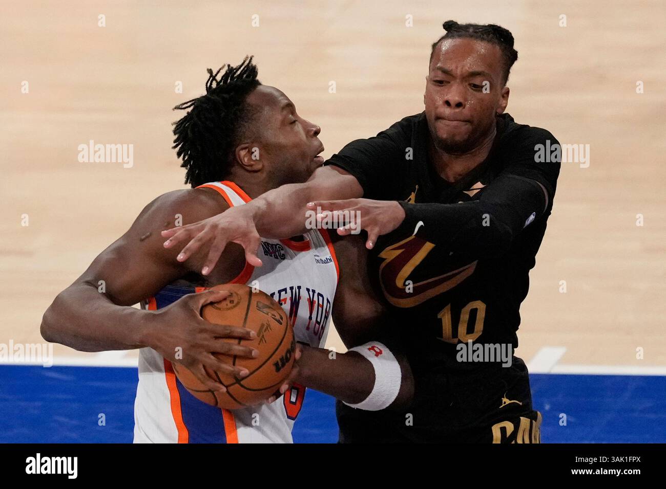 Cleveland Cavaliers' Darius Garland, right, defends New York Knicks' OG ...