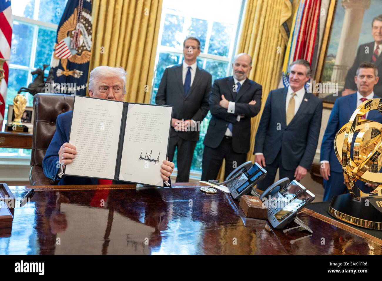 President Donald Trump signs Executive Orders, Wednesday, April 9, 2025 ...