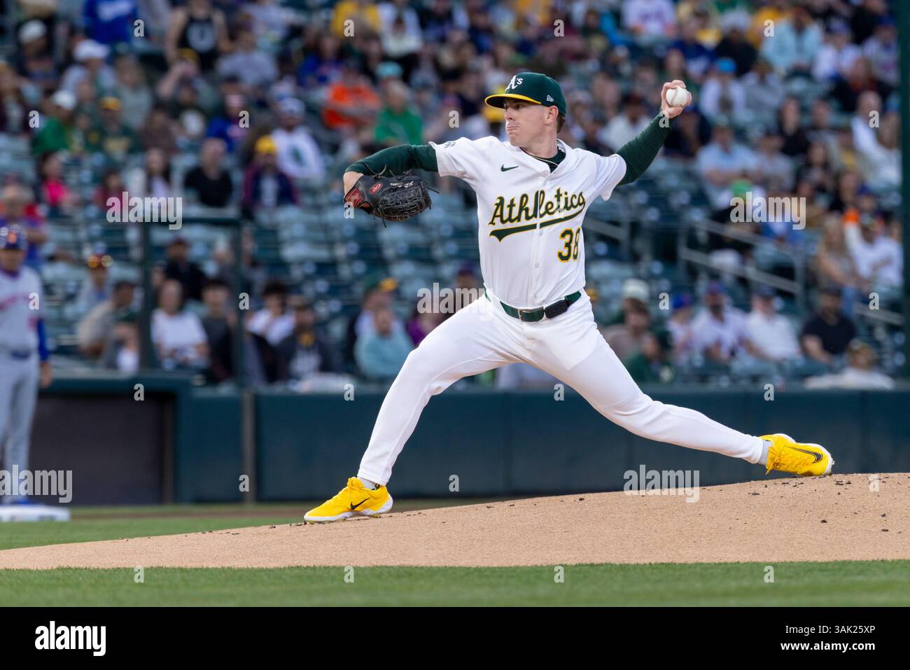 Athletics starting pitcher JP Sears throws against the New York Mets ...