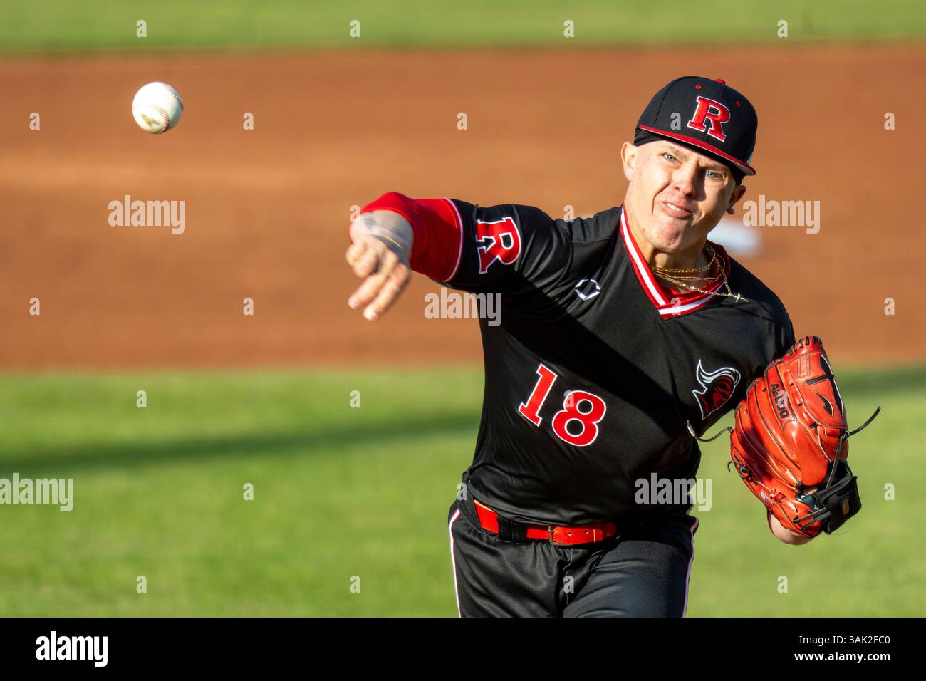 Rutgers pitcher Landon Mack (18) delivers a pitch during an NCAA ...