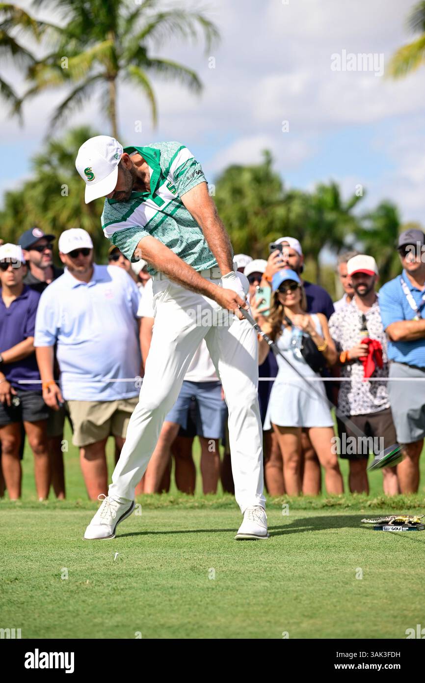 DORAL, FL - APRIL 06: Charl Schwartzel tees off on the 18th hole ...