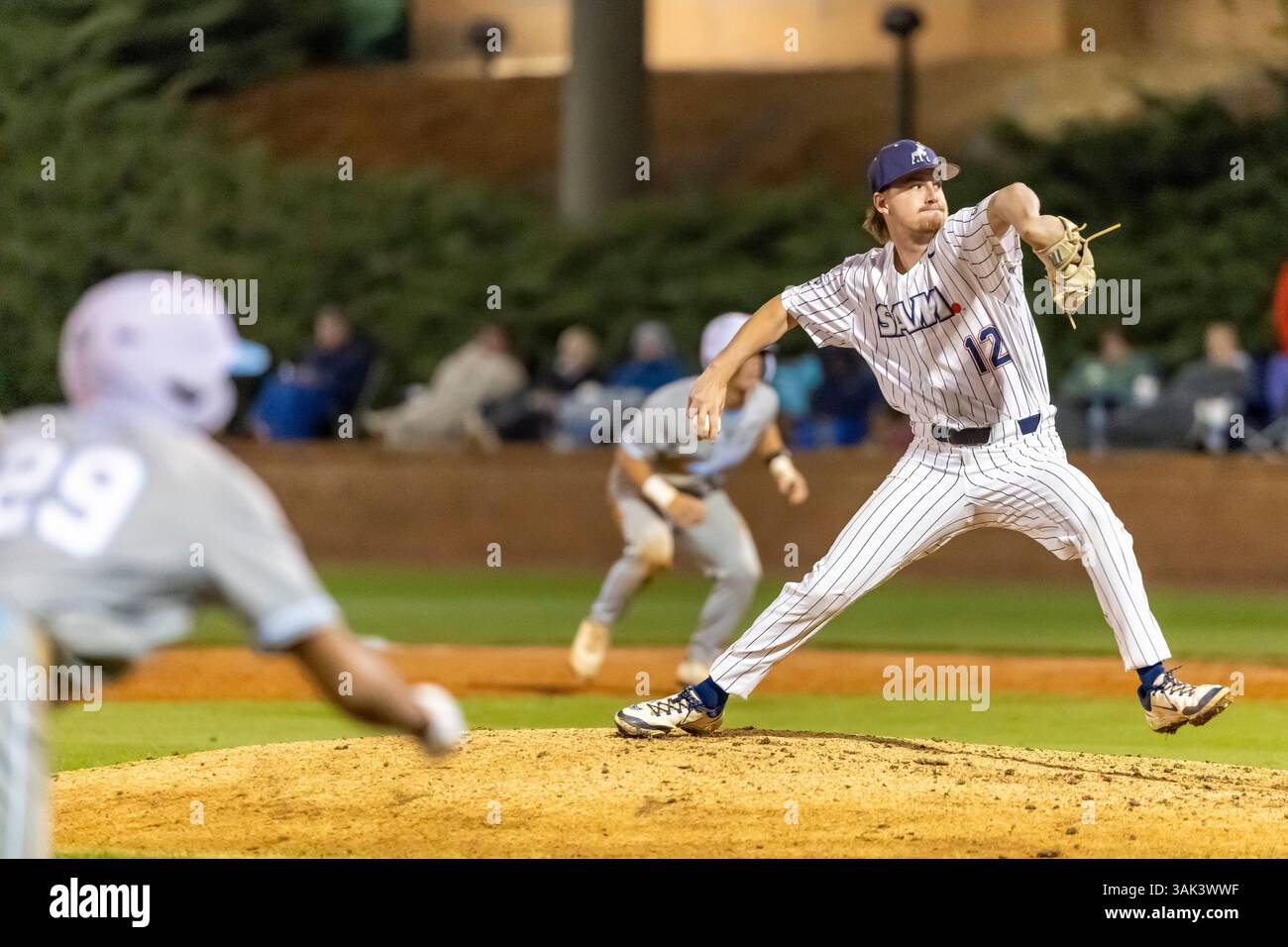 Samford pitcher Trey Sanders (12) pitches against Citadel during an ...
