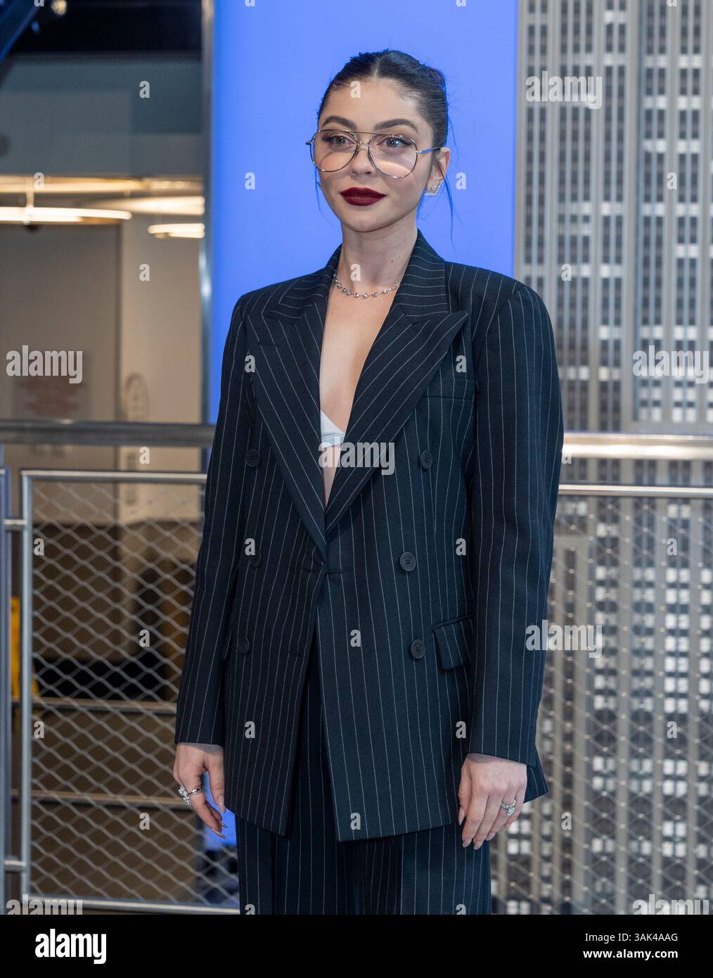 Sarah Hyland wearing suit by Evelyne Chetrite for Sandro Femme attends ...