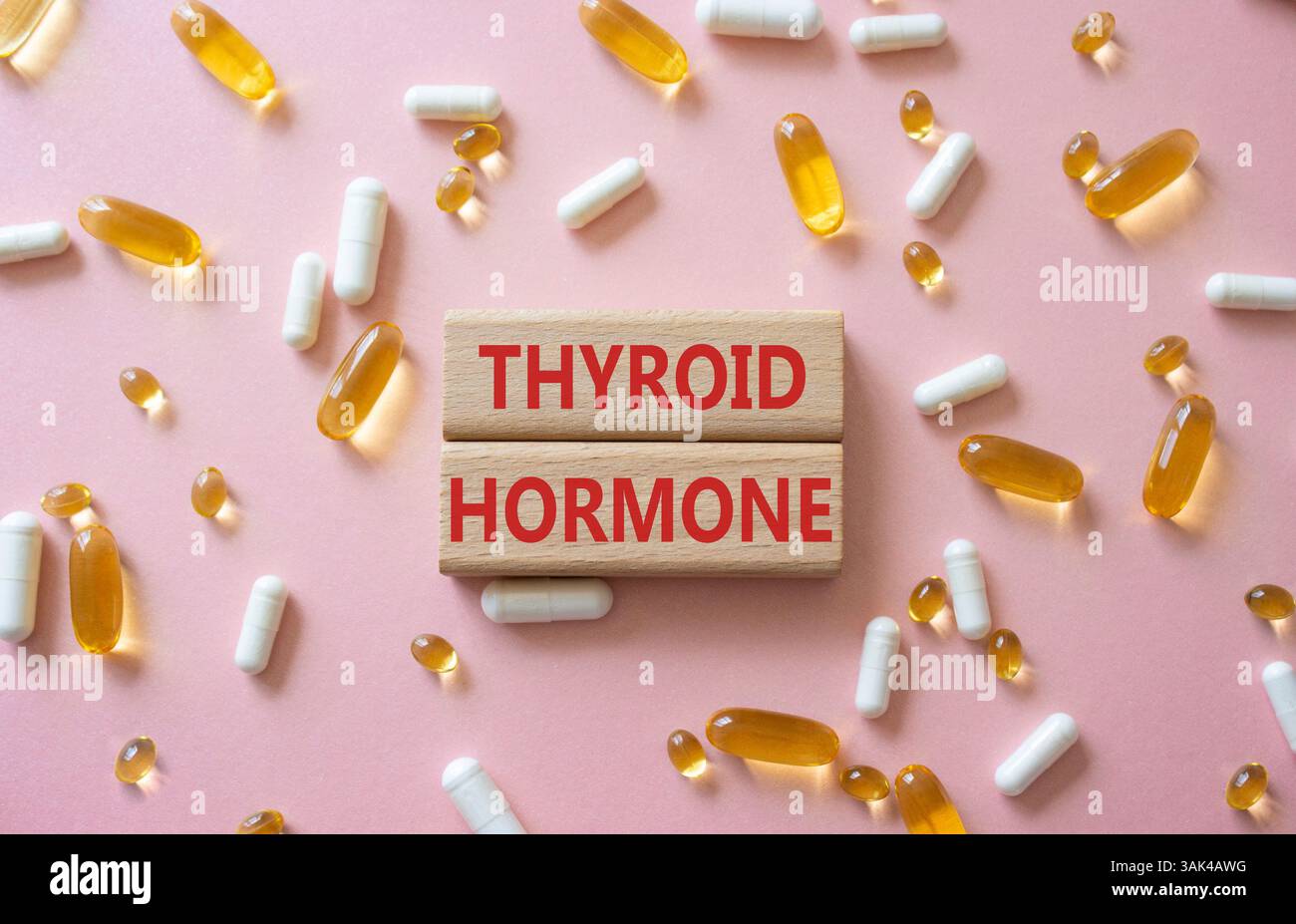 Thyroid Hormone symbol. Concept word Thyroid Hormone on wooden blocks ...