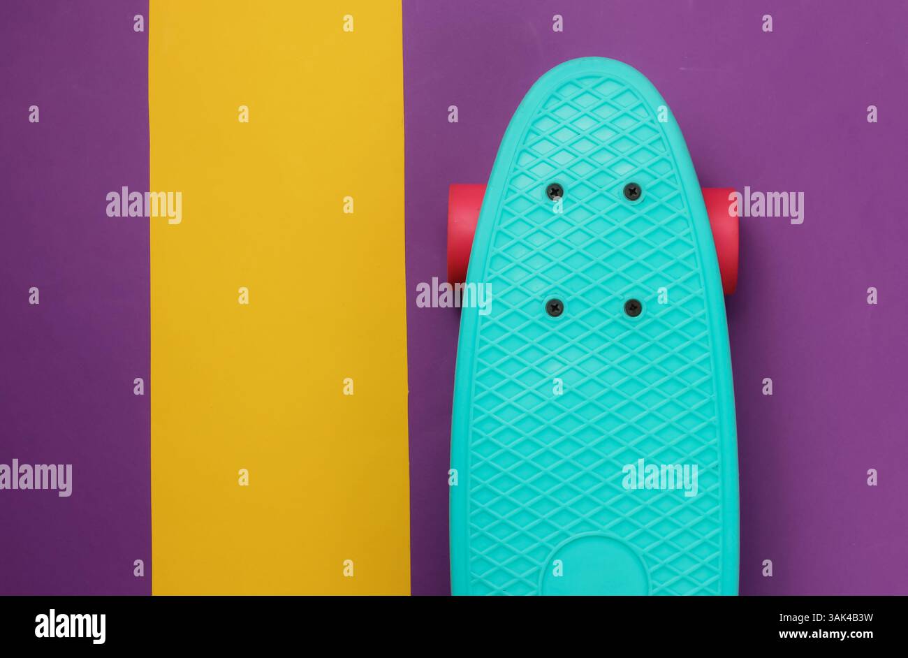 Cruiser board on colored paper background. Summer fun. Studio shot. Top ...