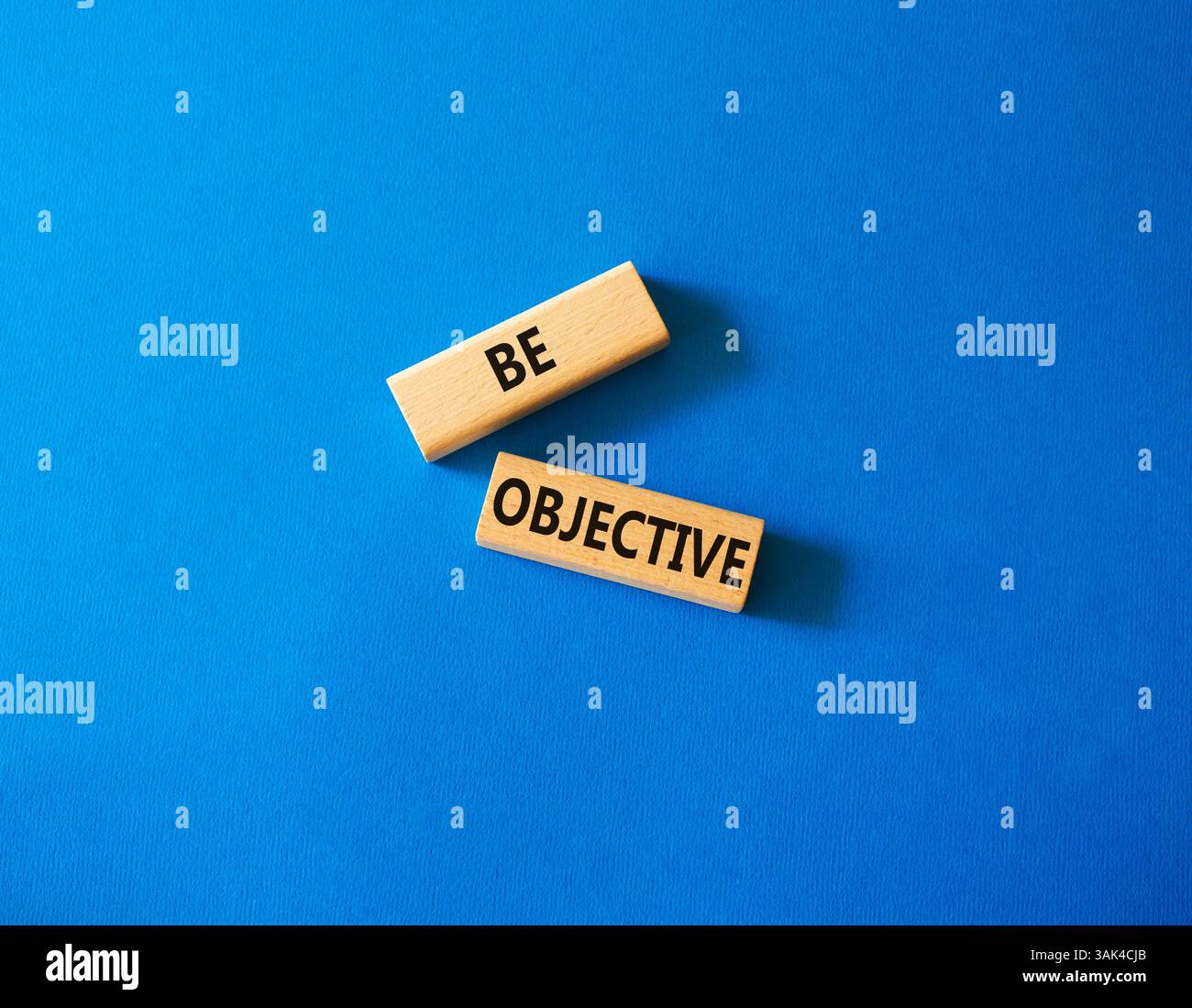 Be Objective symbol. Wooden blocks with words Be Objective. Beautiful ...