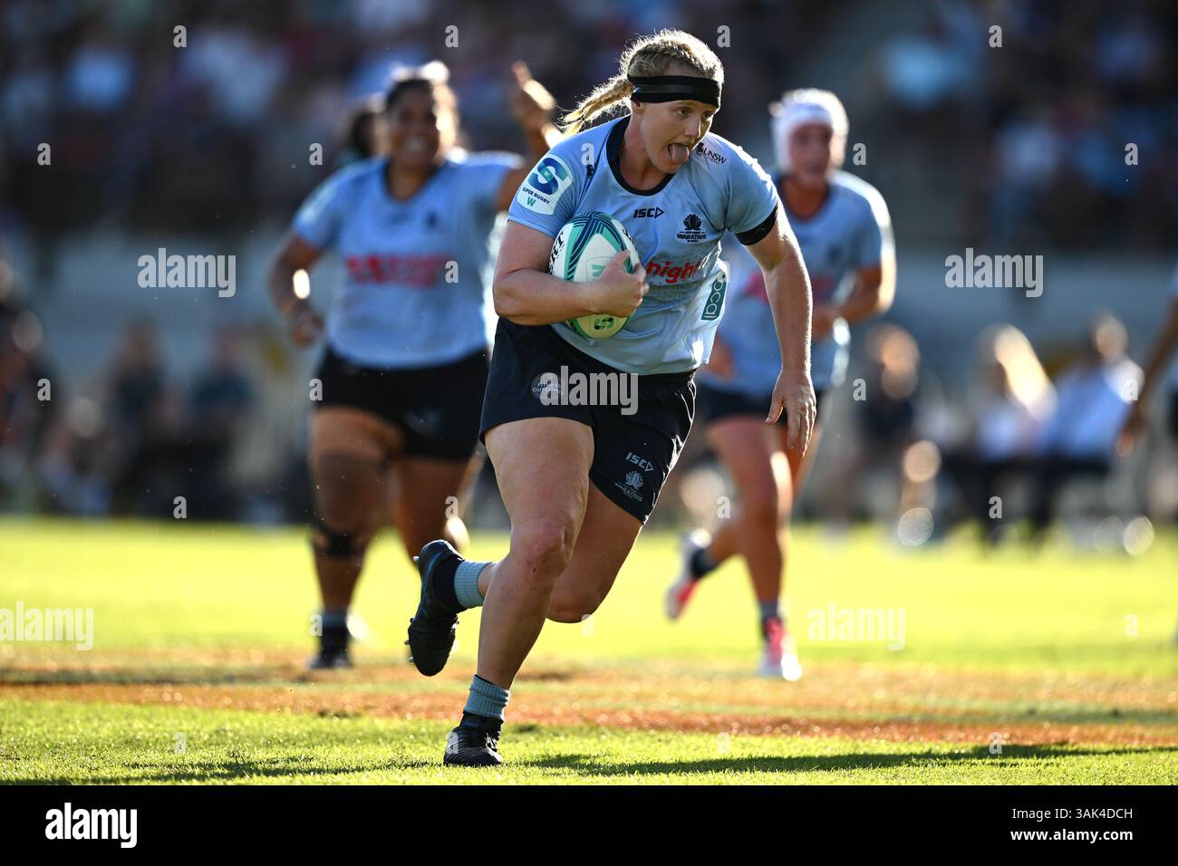 Sydney, Australia. 12th Apr, 2025. Emily Robinson of the Waratahs runs ...
