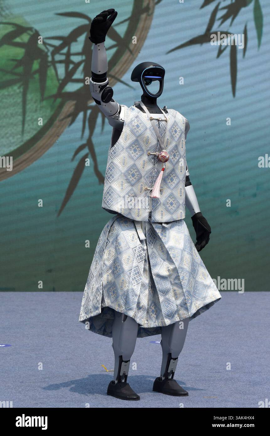 NANNING, CHINA - APRIL 12, 2025 - A UNITREE humanoid robot wears ...