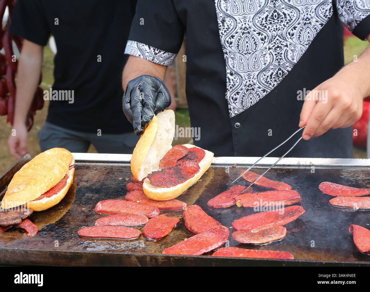 Unidentified Chef cooking Sucuk aka Turkish Pepperoni and making ...