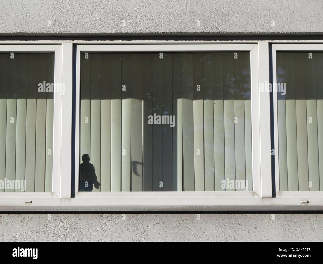 View Through A Window Of The Silhouette Of A Person And A Crescent Moon ...