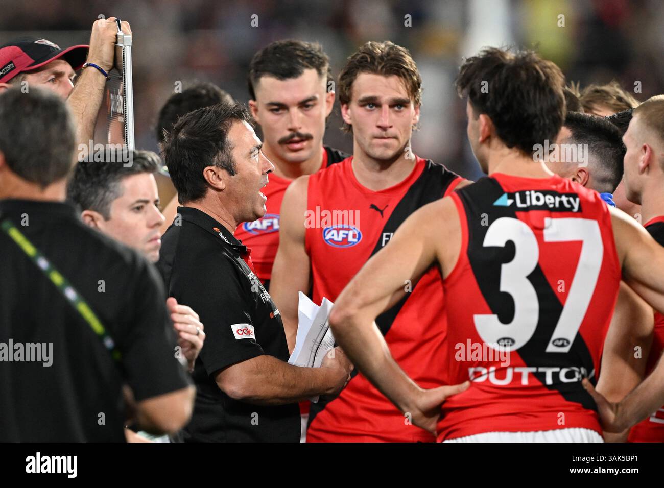 Adelaide, Australia. 12th Apr, 2025. Essendon Senior Coach Brad Scott ...