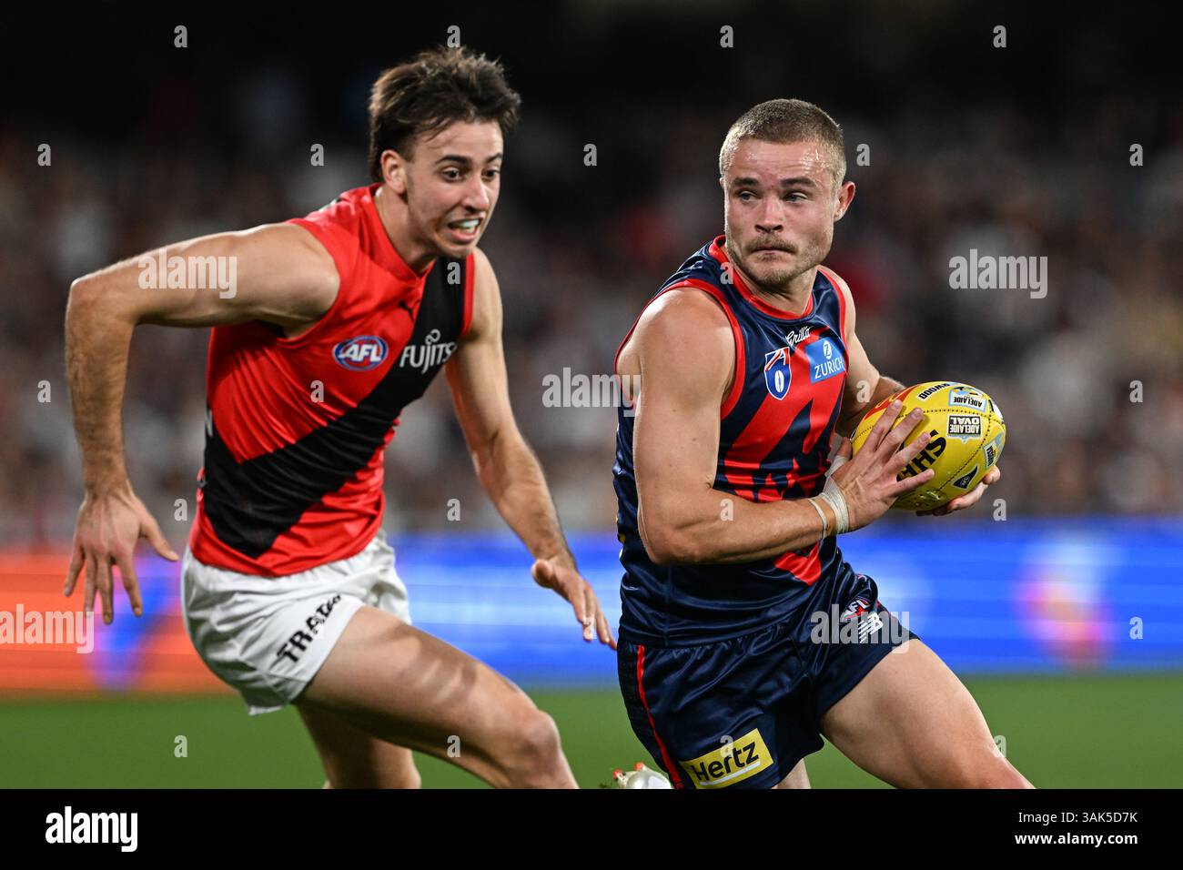 Adelaide, Australia. 12th Apr, 2025. Kade Chandler of Melbourne evades ...