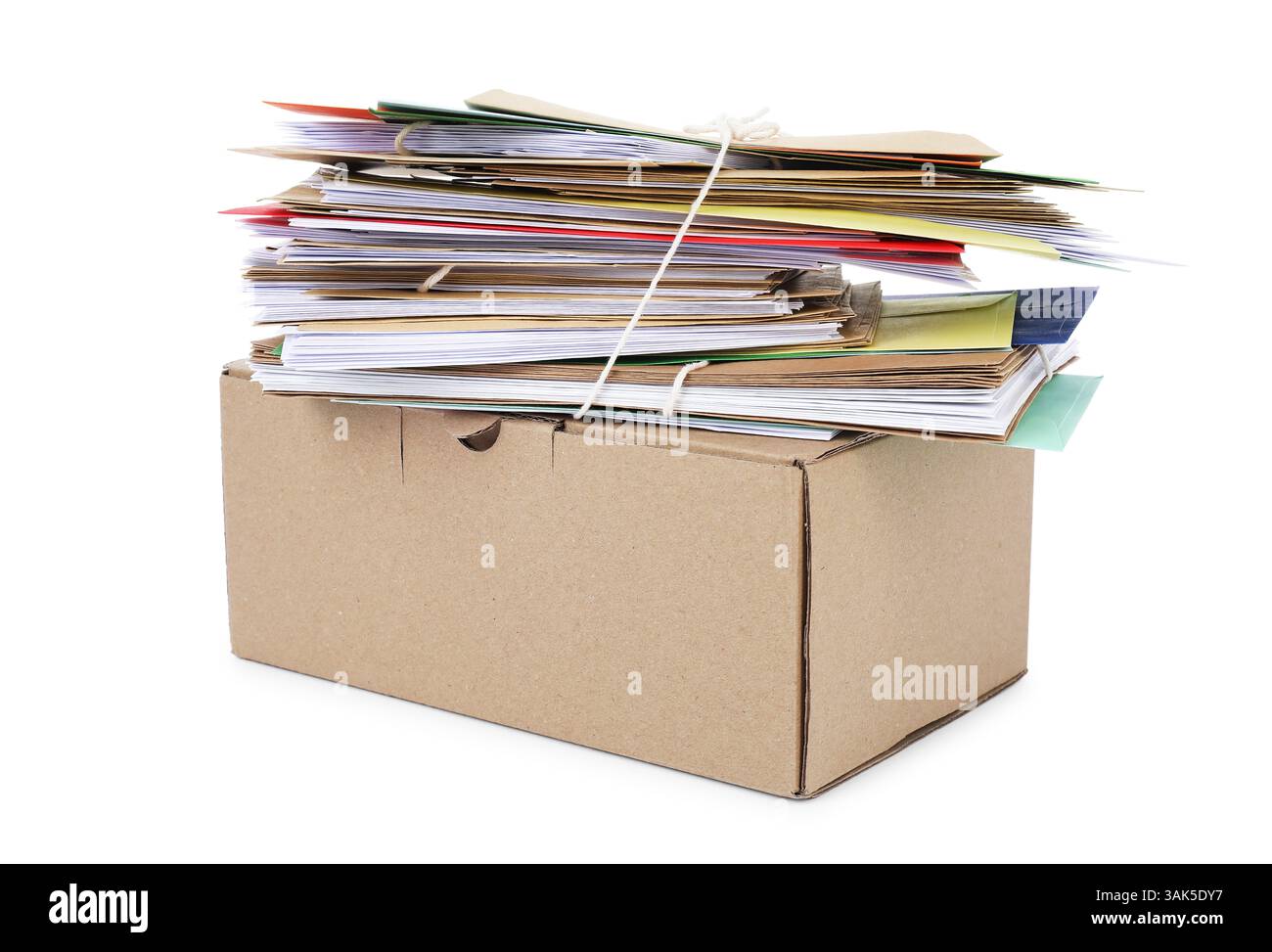 Stack of different paper envelopes and parcel on white background. Post ...