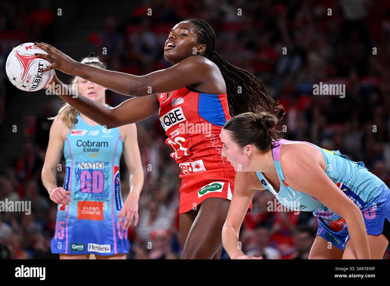 Sydney, Australia. 12th Apr, 2025. Grace Nweke of the Swifts controls ...