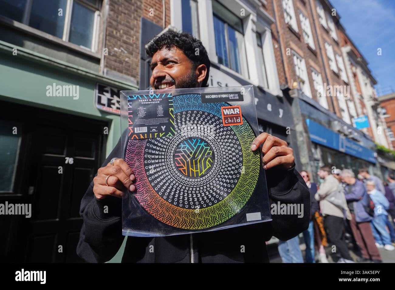 London UK 12 April 2025. A customer holds a vinyl record outside Sister ...