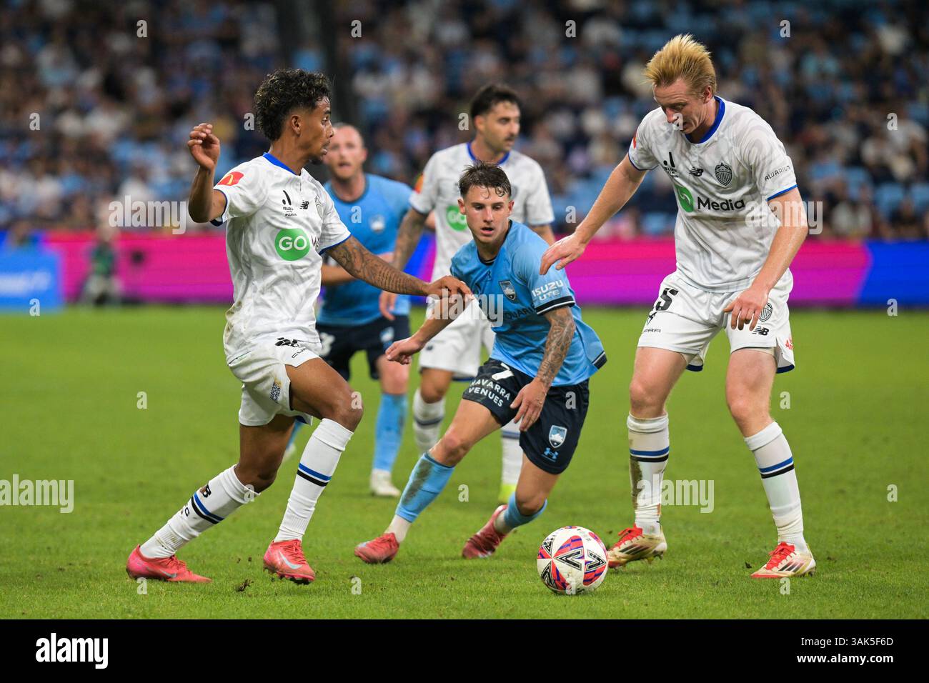 Paddington, Australia. 12th Apr, 2025. Adrian Segecic (C) of Sydney FC ...