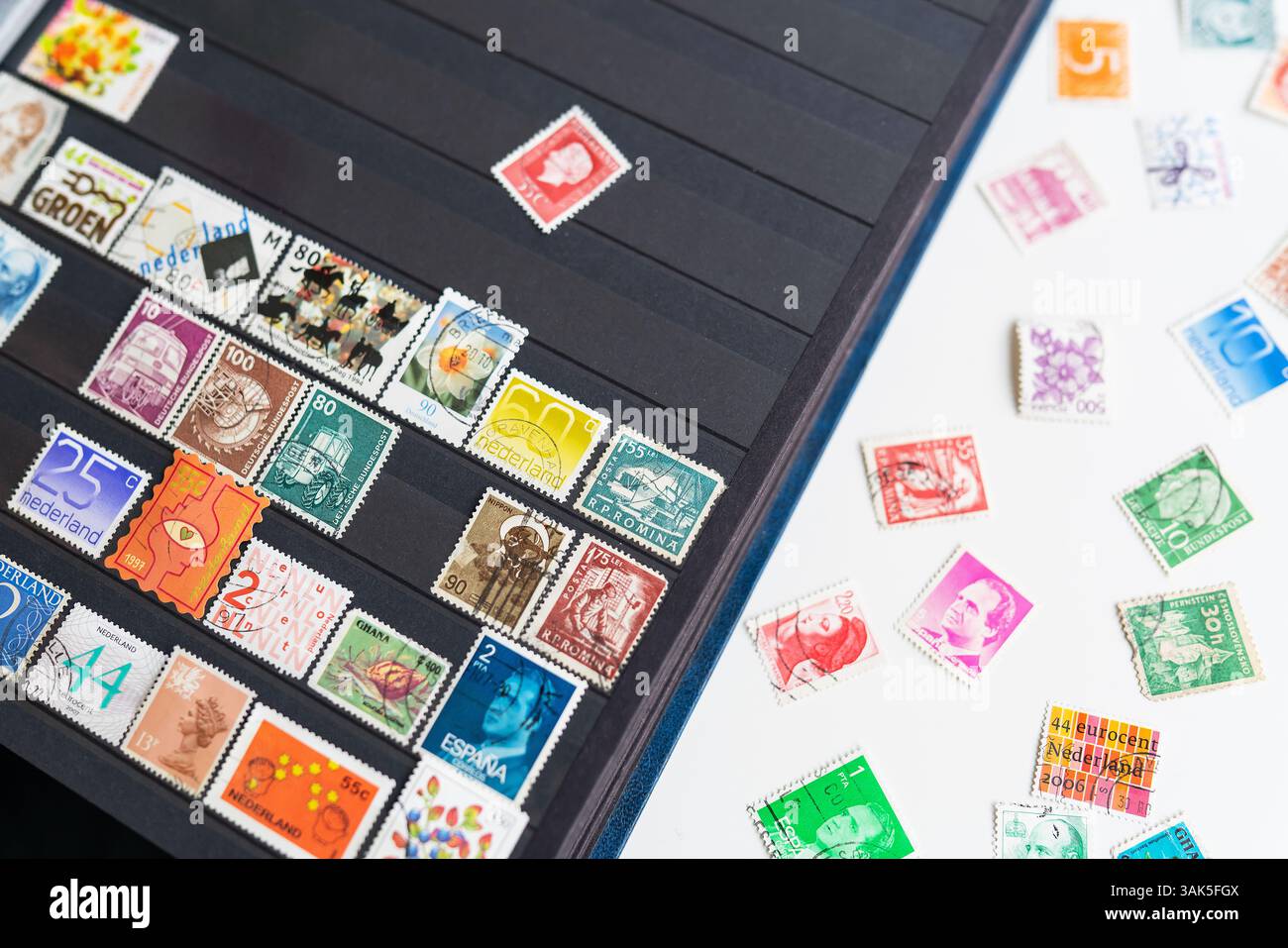 A colorful collection of postage stamps displayed in an album. NY, NY ...