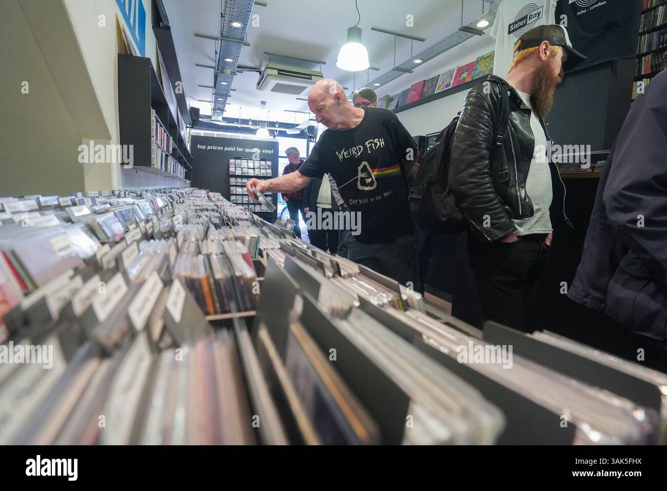 London UK 12 April 2025. Customers inside Sister Ray store in Soho on ...