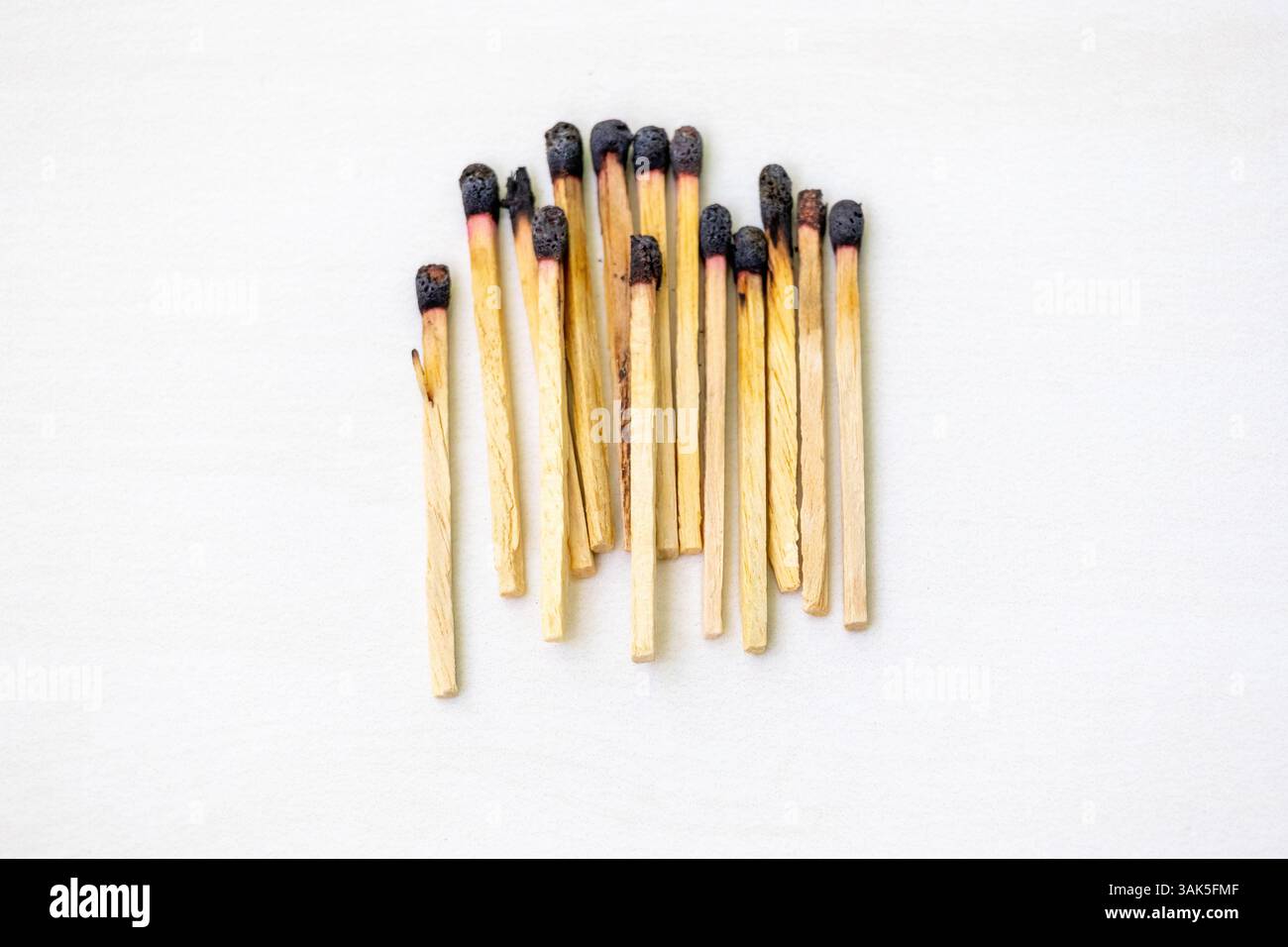 Burnt match sticks isolated on a white background. Many burnt wooden ...