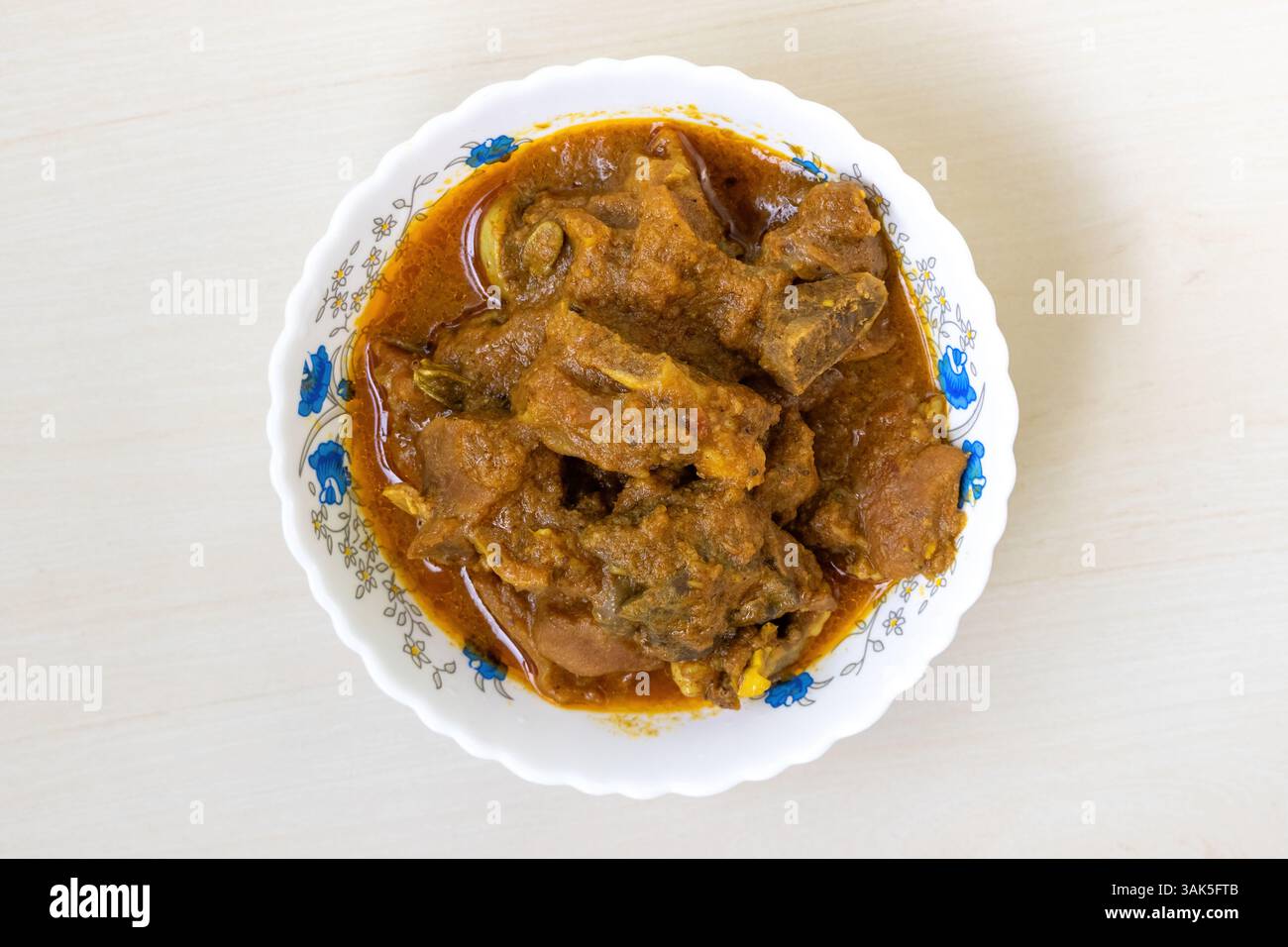 Delicious mutton curry in a white bowl on a wooden background. Mutton ...