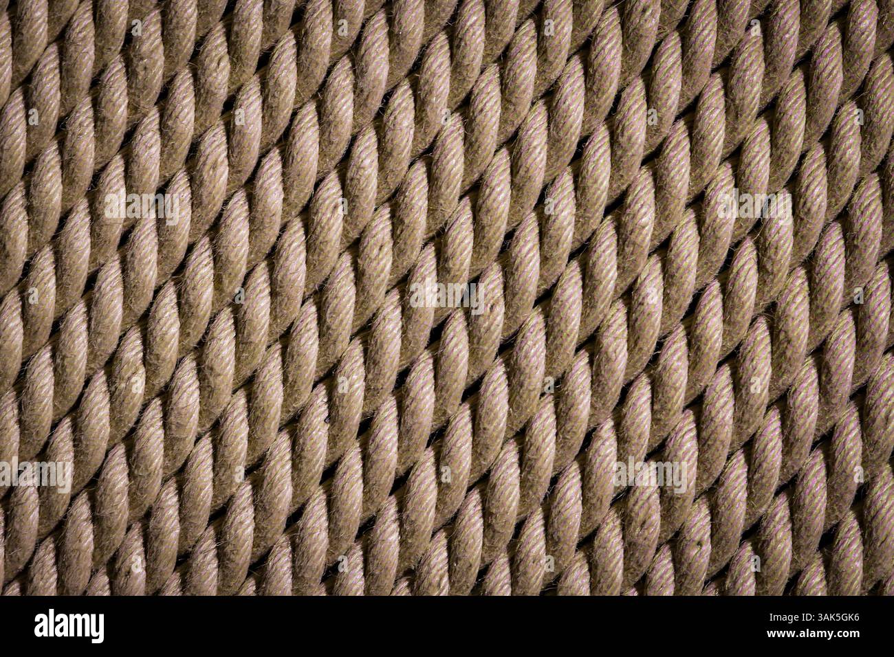Rope background pattern of twisted natural flax traditionally crafted ...