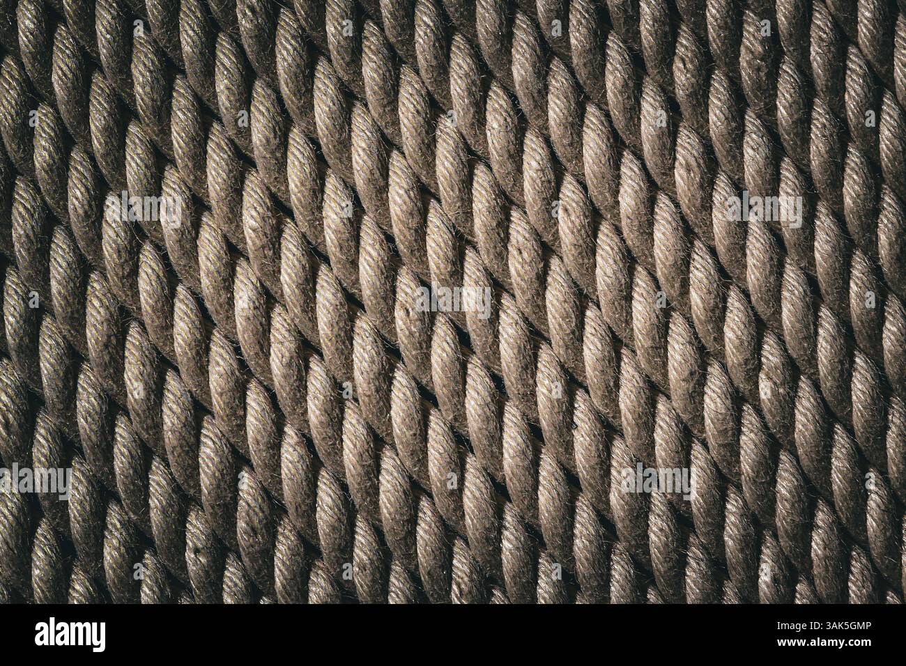 Rope background pattern of twisted natural flax traditionally crafted ...