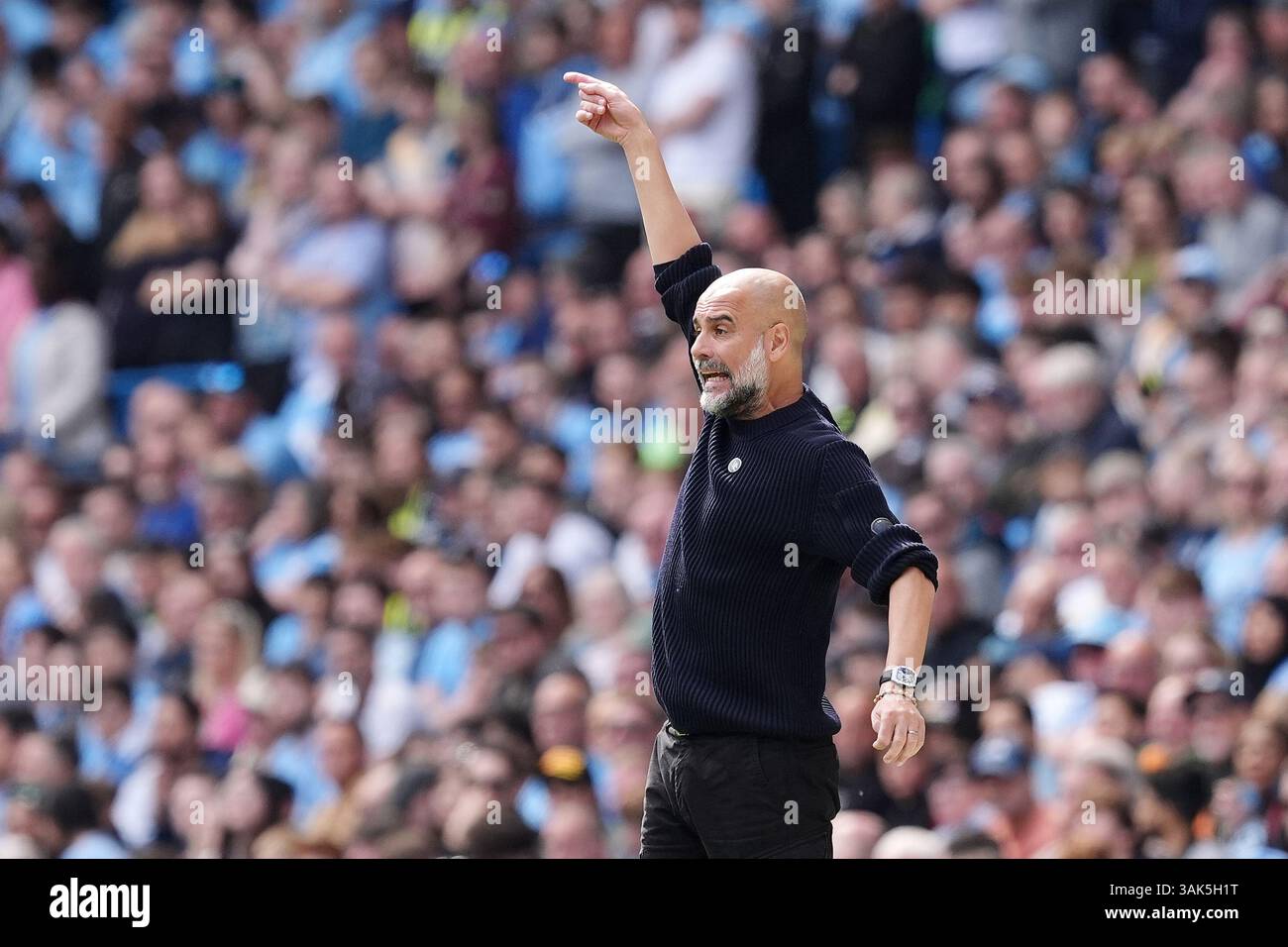 Manchester City manager Pep Guardiola gestures on the touchline during ...