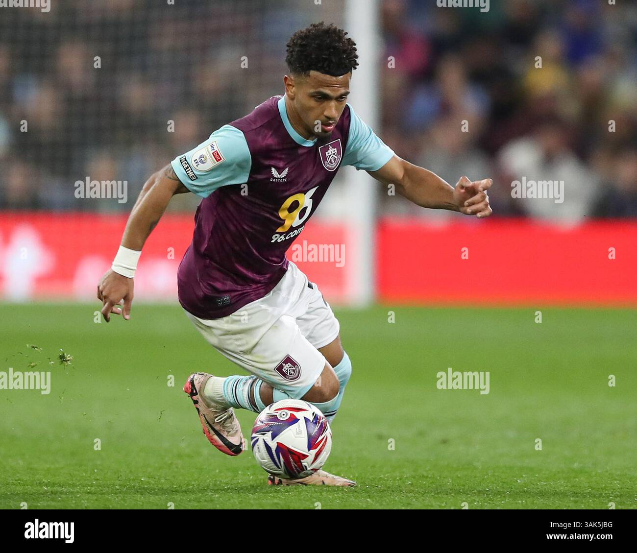 Burnley, UK. 11th Apr, 2025. Marcus Edwards of Burnley with ball at his ...