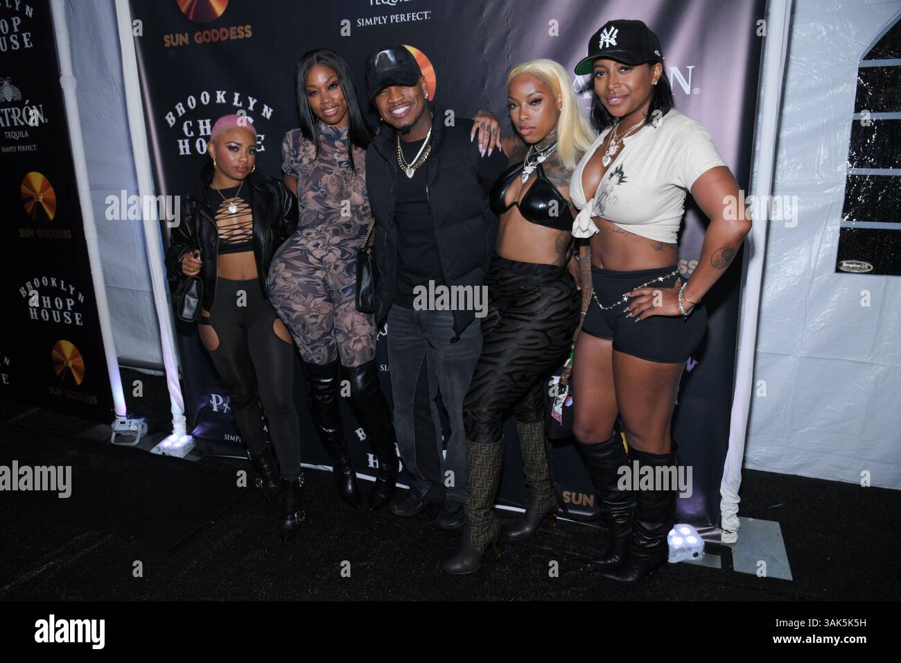 New York, USA. 11th Apr, 2025. Ne-Yo (C) with girlfriends, Brionna ...
