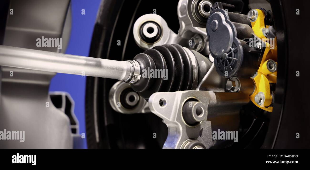 Car suspensions. Close up of a car suspension parts system such as CV ...