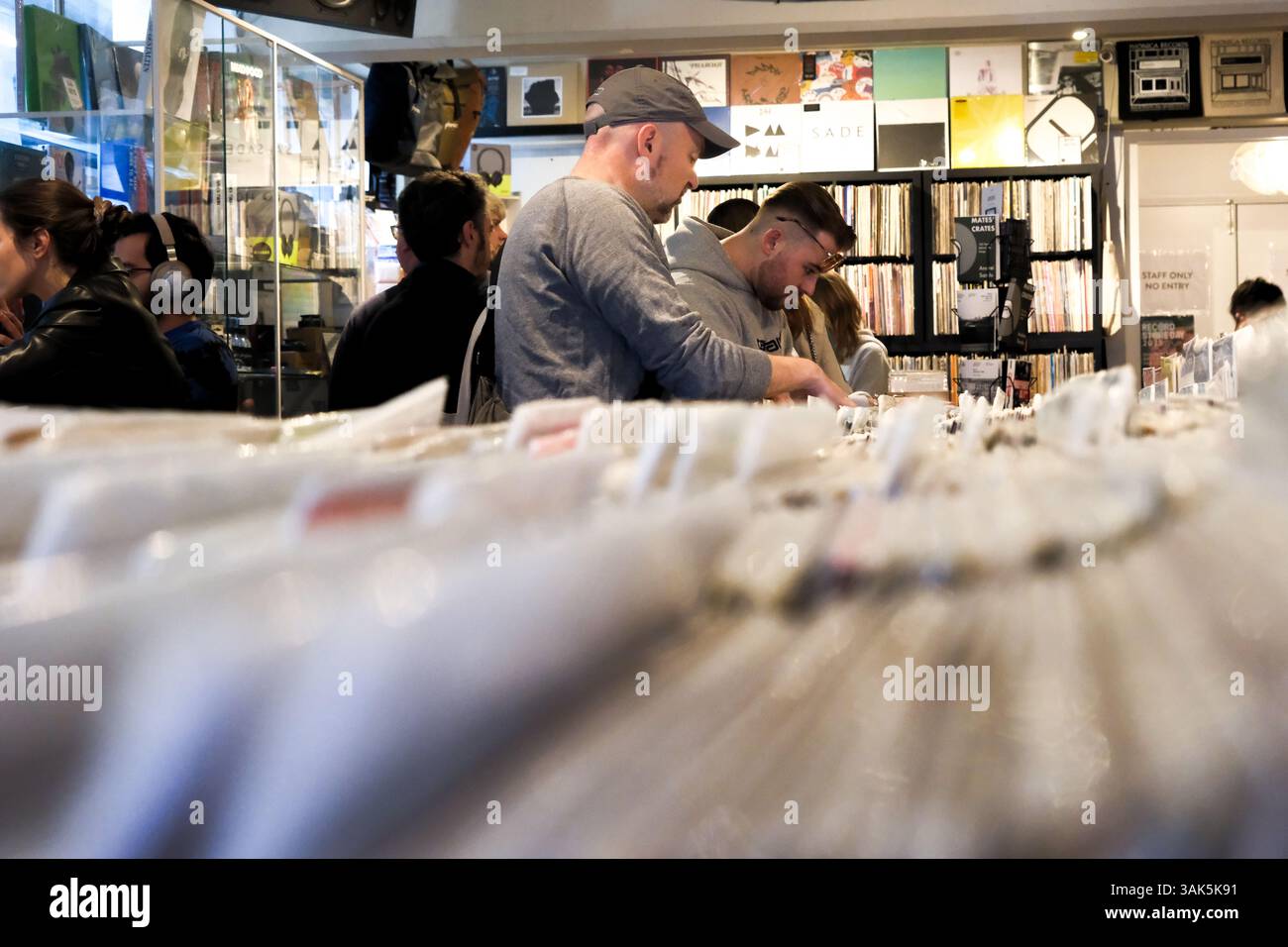 Soho, London, UK. People queue and browse at Record Store Day 2025 in ...