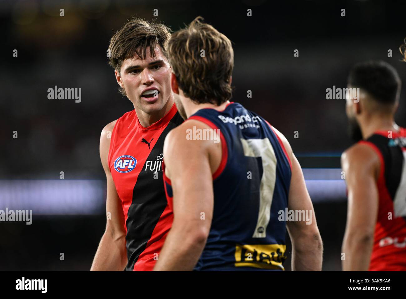 Adelaide, Australia. 12th Apr, 2025. Sam Durham of Essendon and Jack ...