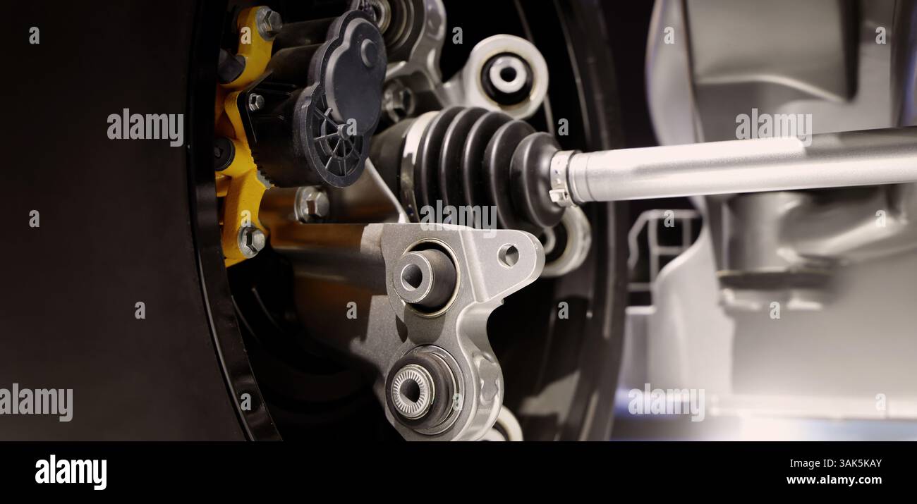 Car suspensions. Close up of a car suspension parts system such as CV ...