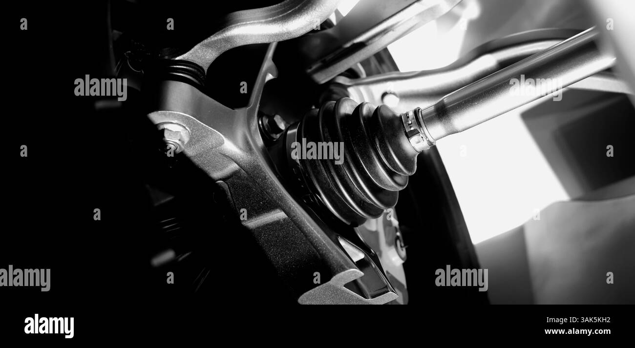 Car suspensions. Close up of a car suspension parts system such as CV ...