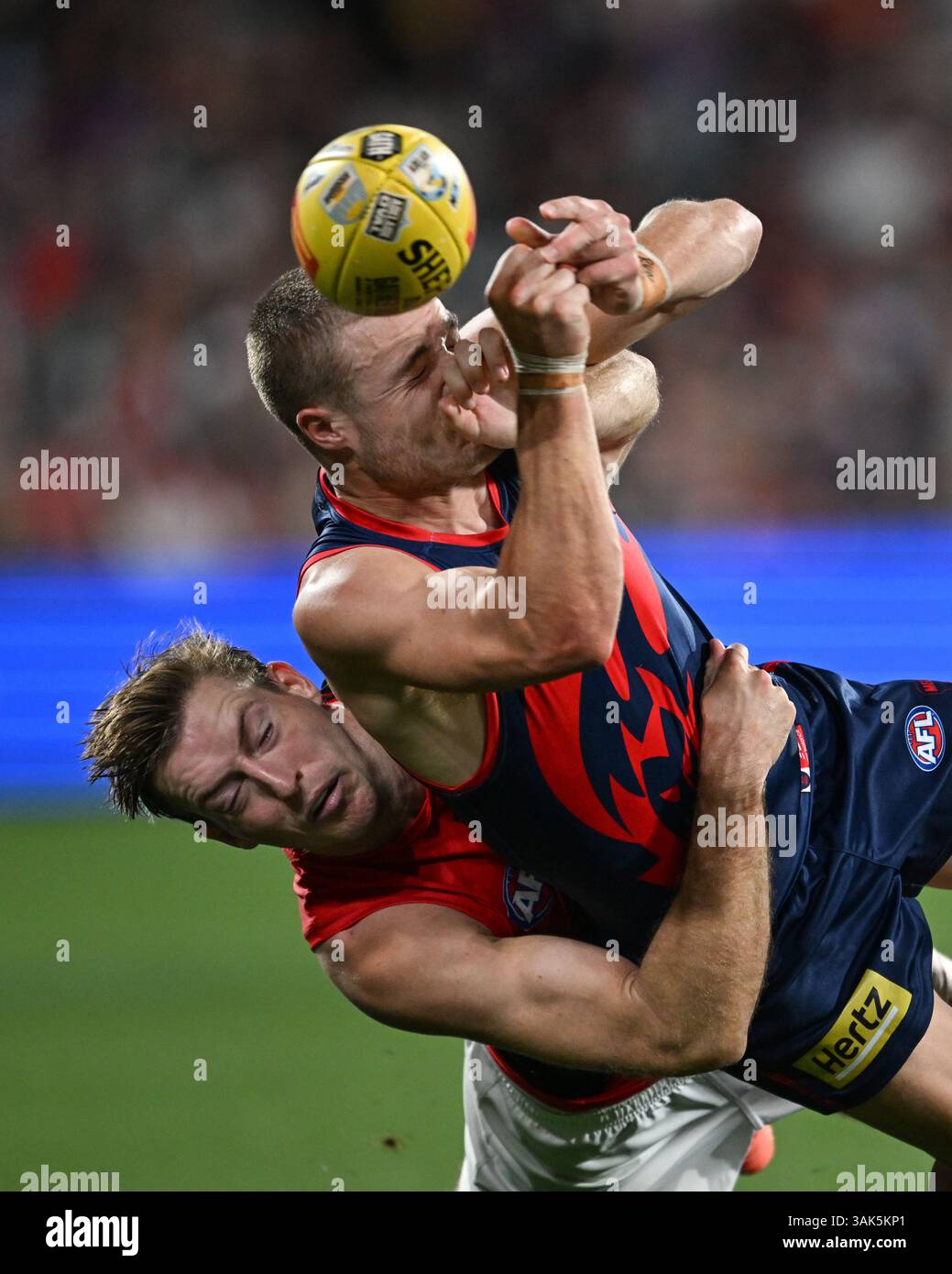 Adelaide, Australia. 12th Apr, 2025. Kade Chandler of Melbourne tackled ...